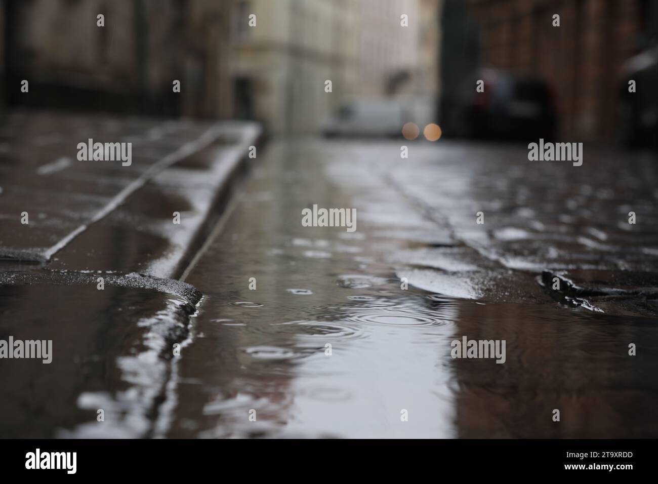 Rippled puddle on pavement hi-res stock photography and images - Alamy