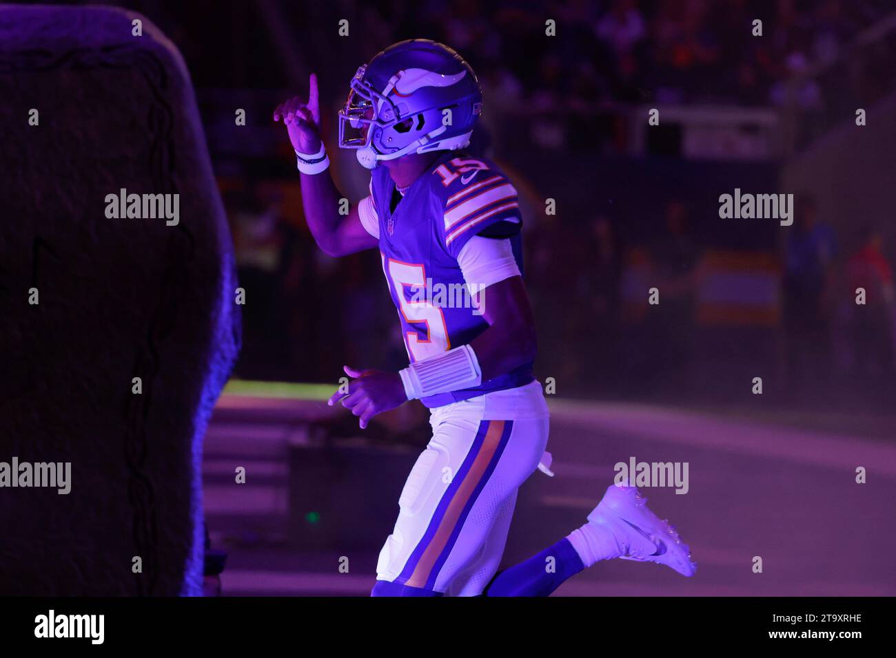 Minnesota Vikings quarterback Joshua Dobbs (15) runs onto the field ...
