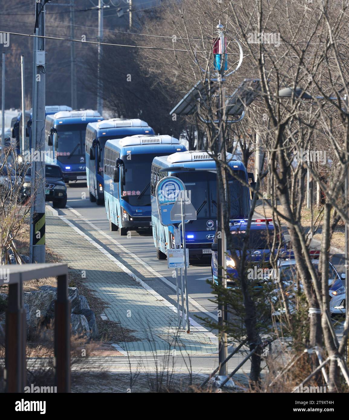 28th Nov, 2023. Inmate transfer Buses carrying inmates enter a newly ...