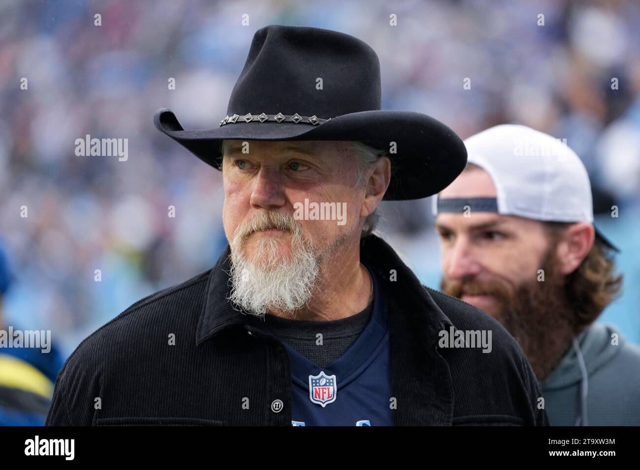 Country music entertainer Trace Adkins leaves the field after singing ...