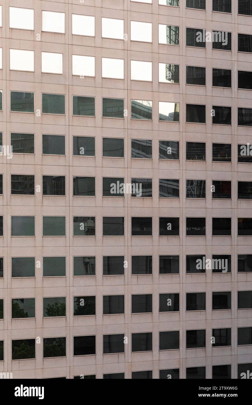 Windows of a building with reflections, adding depth to the ...