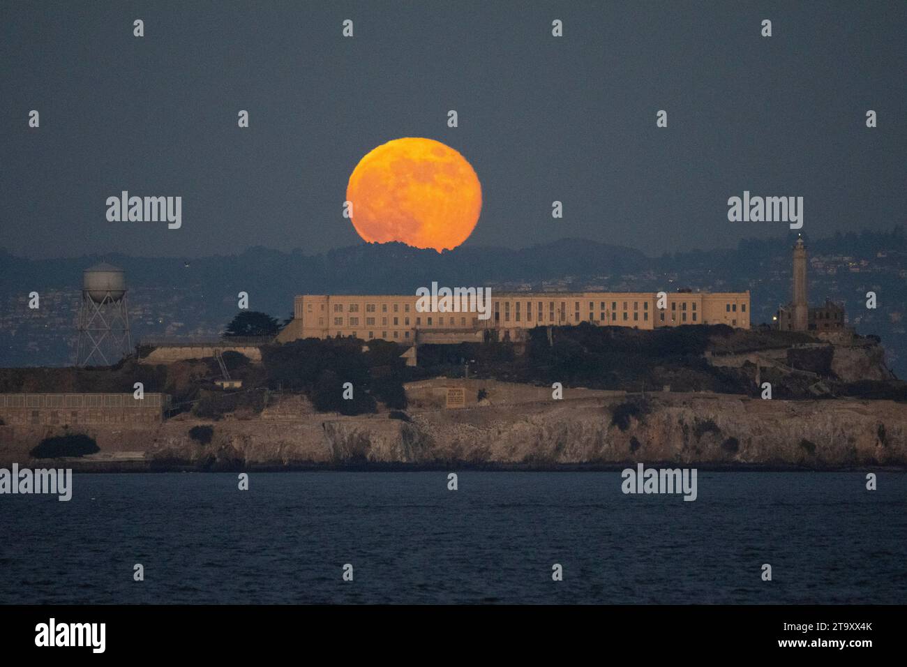 A full moon, also known as the Beaver Moon, rises above Alcatraz Island ...