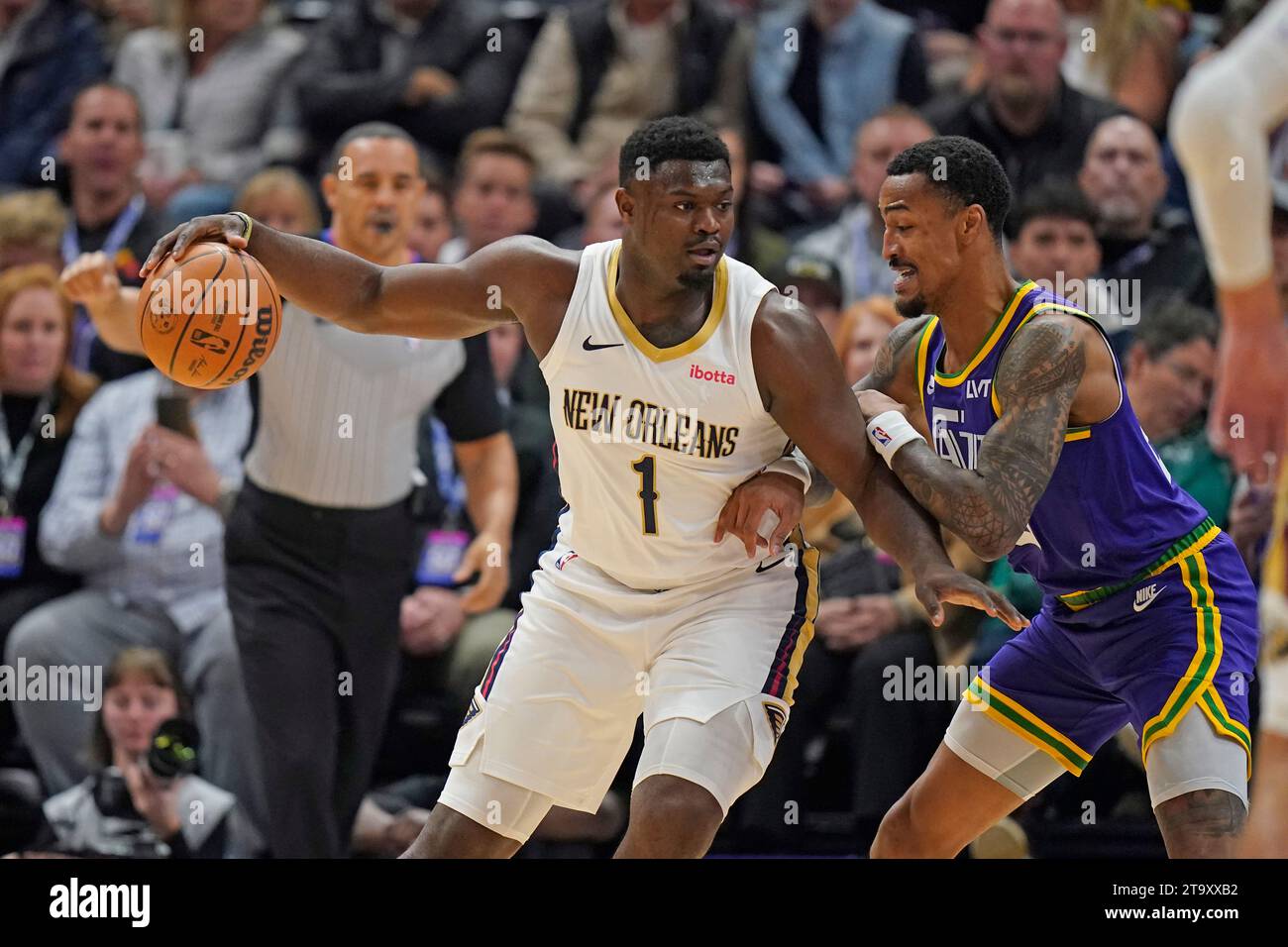 Utah Jazz forward John Collins, right, guards against New Orleans ...