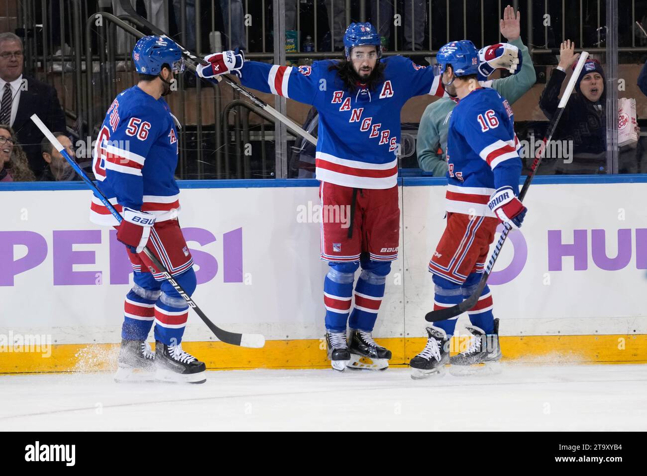 New York Rangers' Mika Zibanejad, center, celebrates his goal with ...