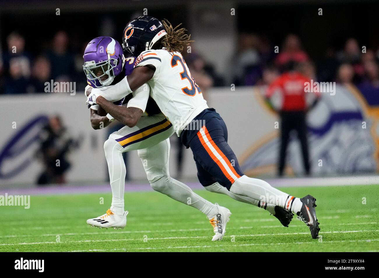 Minnesota Vikings wide receiver Jordan Addison (3) is tackled by Chicago Bears cornerback Terell ...
