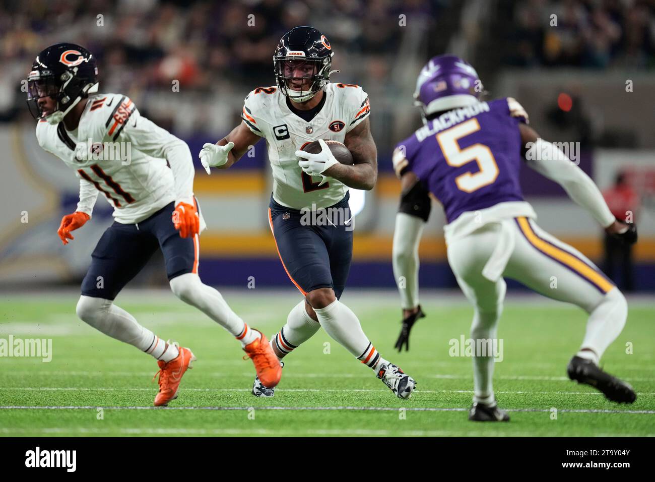 Chicago Bears wide receiver DJ Moore (2) runs from Minnesota Vikings cornerback Mekhi Blackmon ...