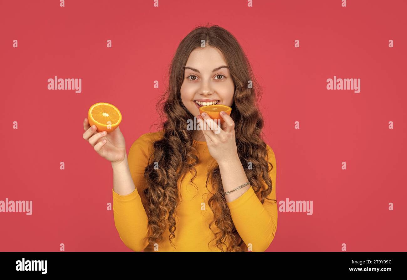 Teen child eat orange hi-res stock photography and images - Alamy