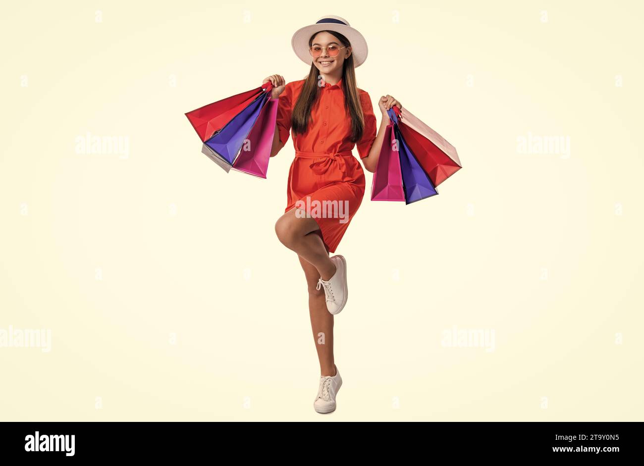 cheerful teen shopper girl on background. photo of teen shopper girl ...