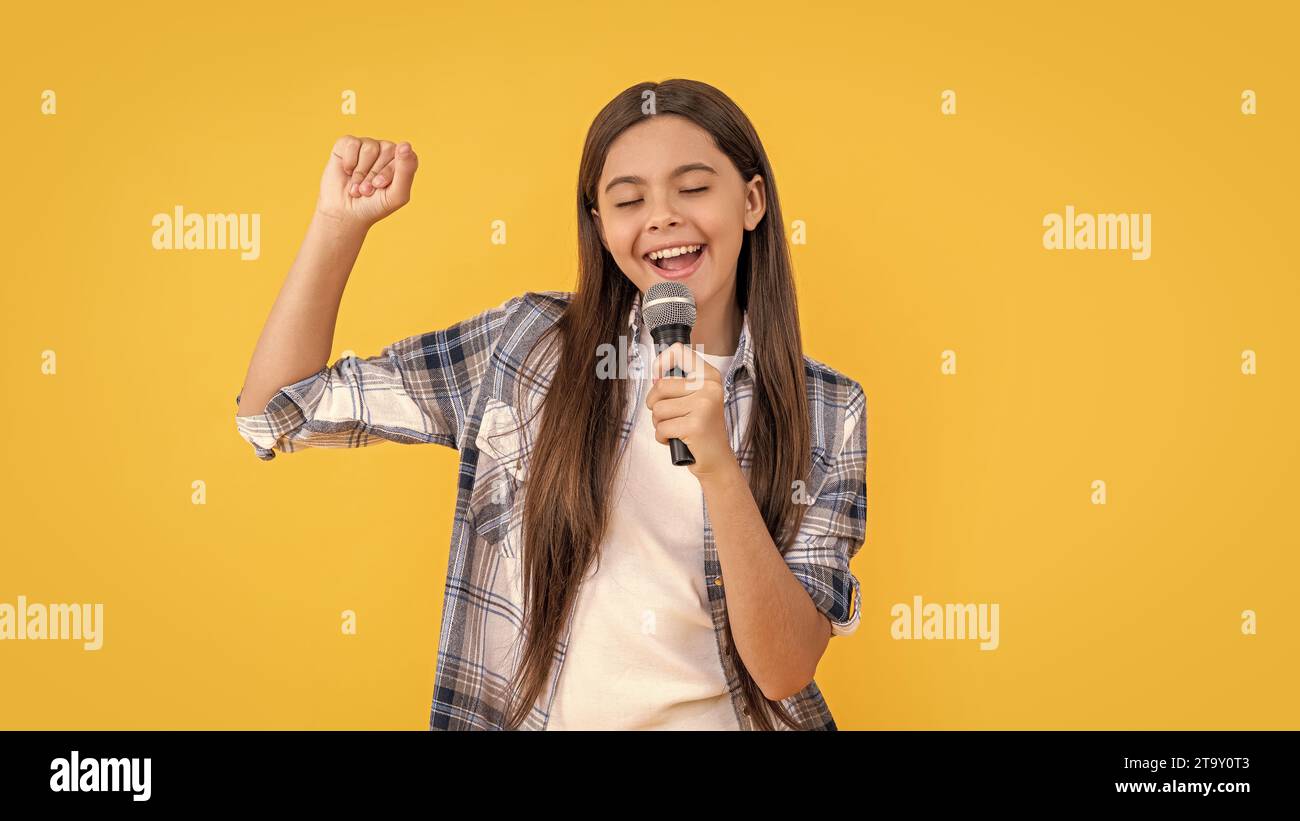 cheerful teen girl karaoke singer in studio. teen girl karaoke singer ...