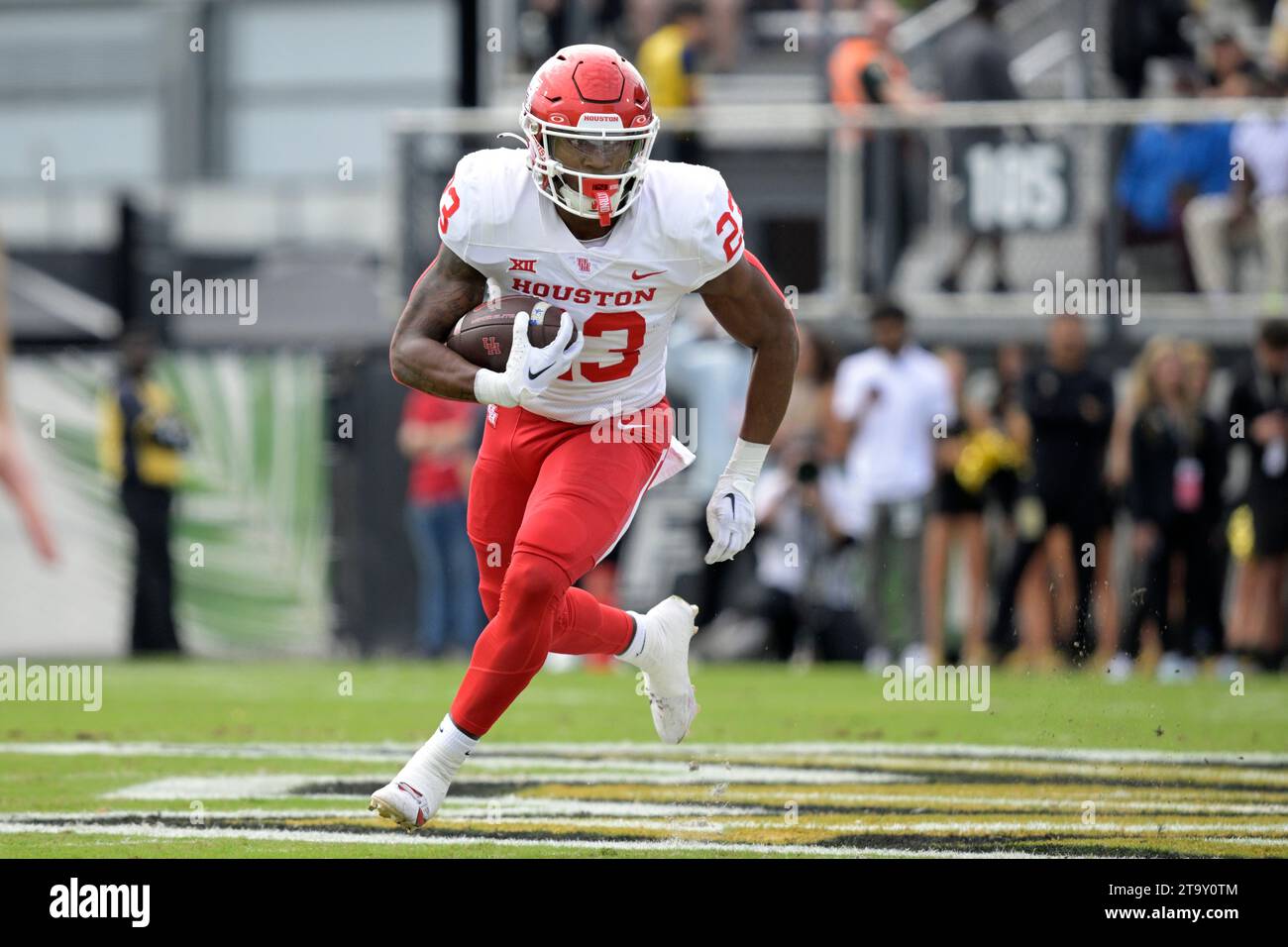 Houston running back Parker Jenkins (23) rushes for yardage during the ...