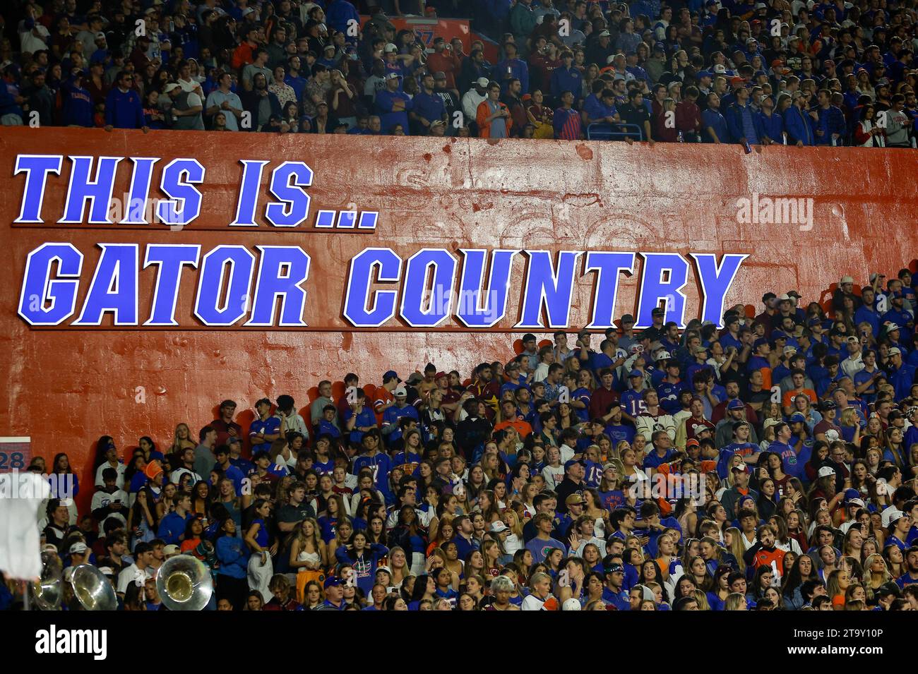 GAINESVILLE, FL - NOVEMBER 25: Florida Gators fans and stadium signage ...
