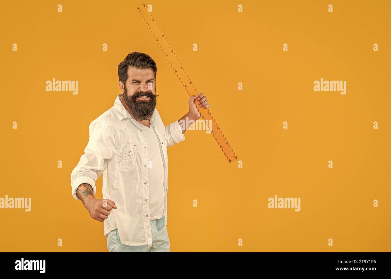 Angry teacher and ruler hi-res stock photography and images - Alamy