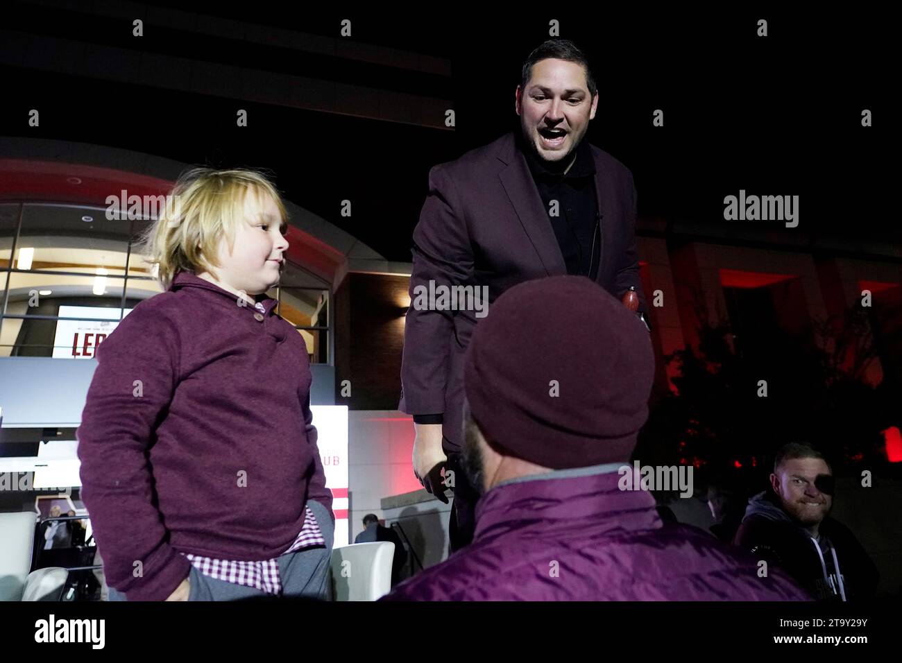 Jeff Lebby, 39, top, is joined by his son Kane Lebby, left, in greeting ...