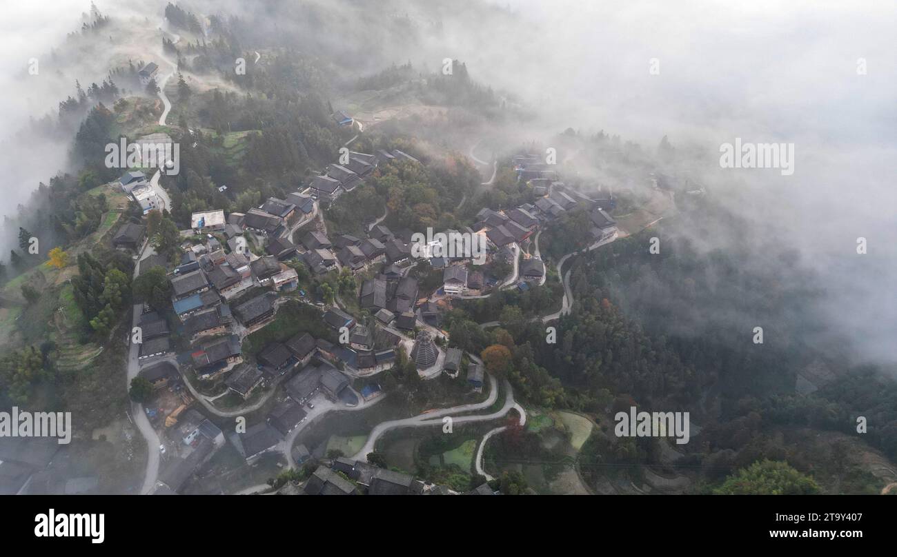 QIANDONGNAN, CHINA - NOVEMBER 28, 2023 - Jianhua Village surrounded by ...