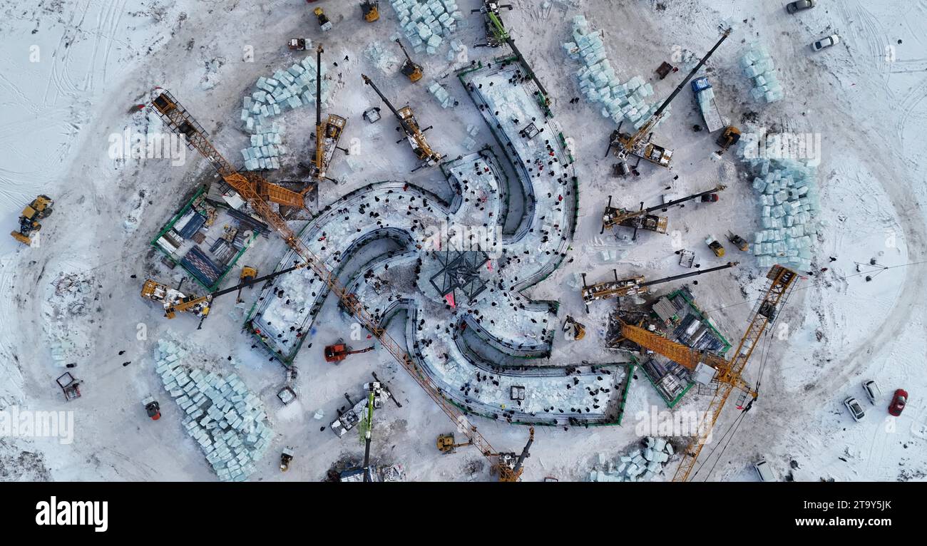 Aerial photo shows workers constructing the Harbin Ice and Snow World ...