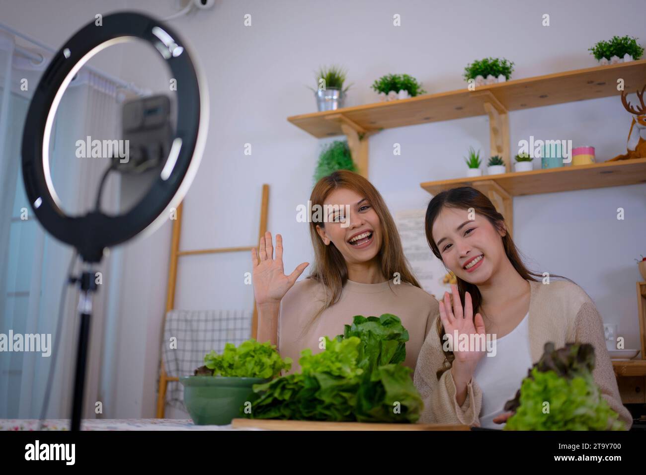 Pretty woman is livestreaming for sell healthy food. Vlogging and ...