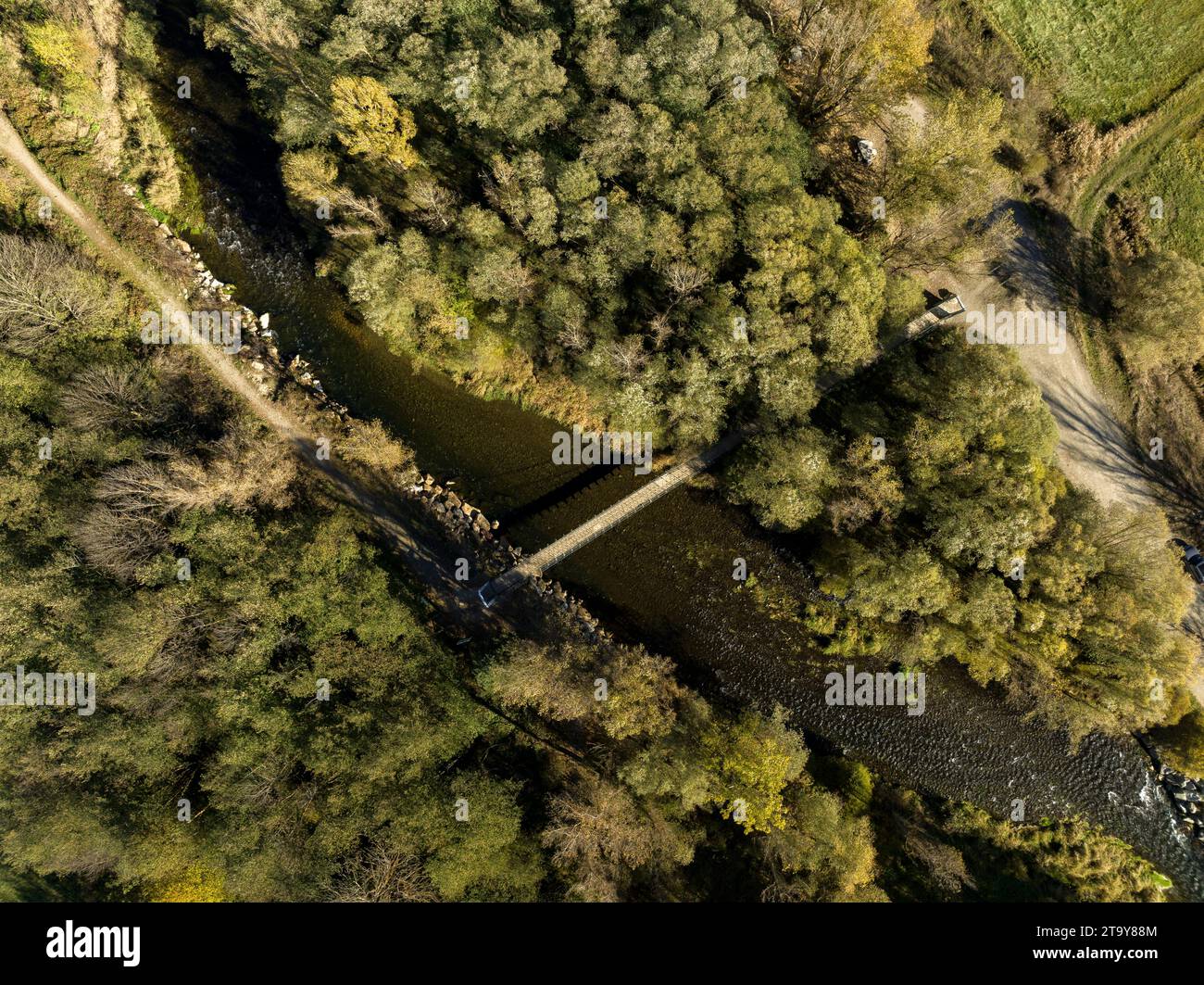 Aerial view of the simple suspension bridge walkway over the Segre ...