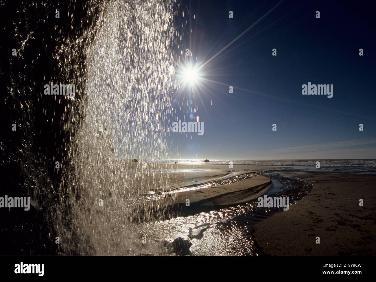 Beach waterfall, Hug Point State Park, Oregon Stock Photo - Alamy