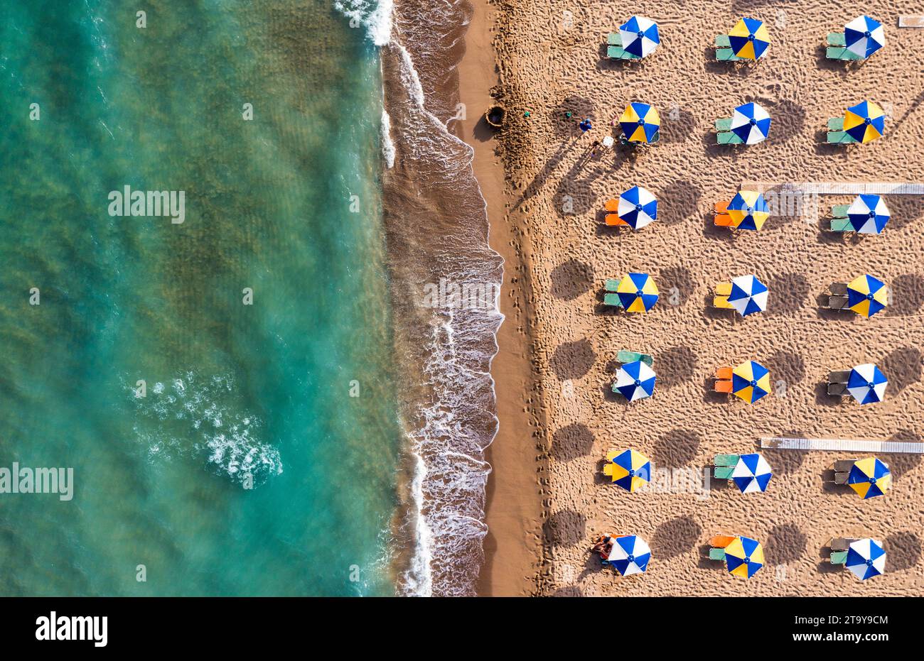 Concept of summer vacation. View from above, stunning aerial view of an amazing beach with beach ...
