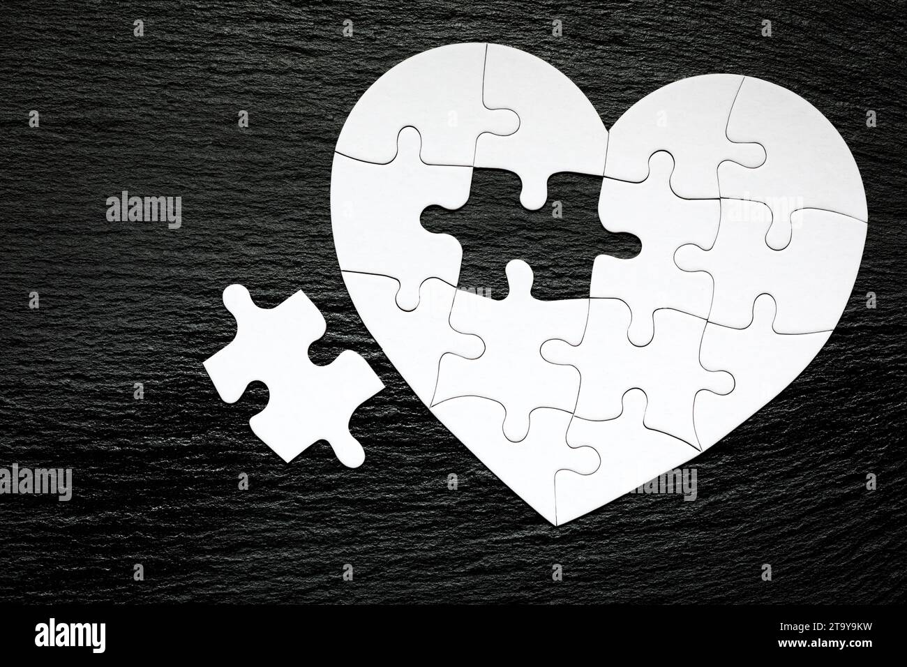 Heart puzzle hi-res stock photography and images - Alamy