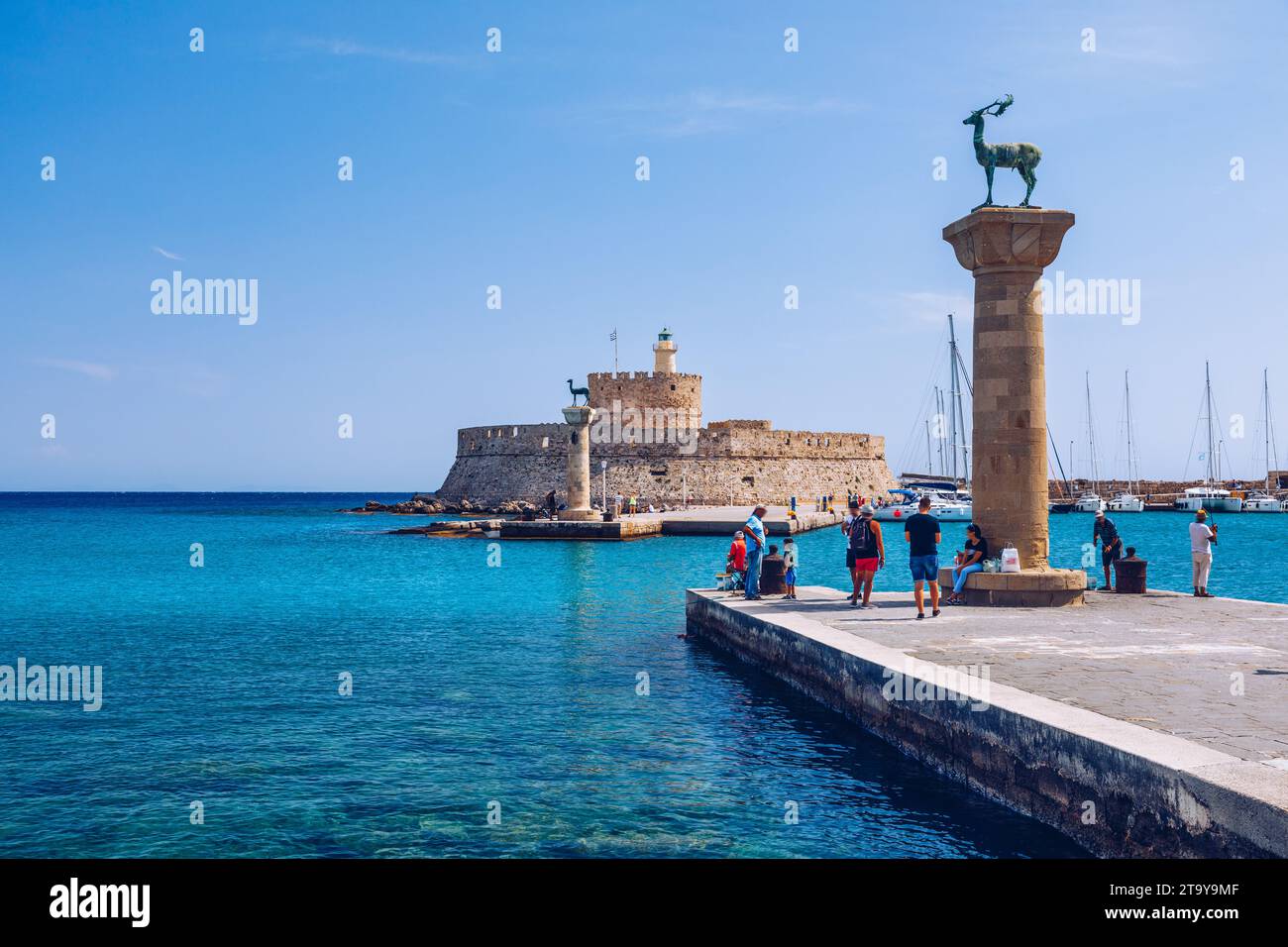 Mandraki port with deers statue, where The Colossus was standing and ...