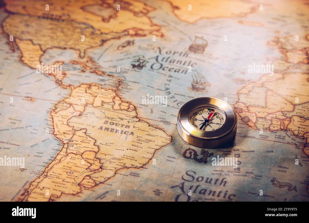 Golden Compass and the Map. Travel and Navigation Theme. Map used for ...