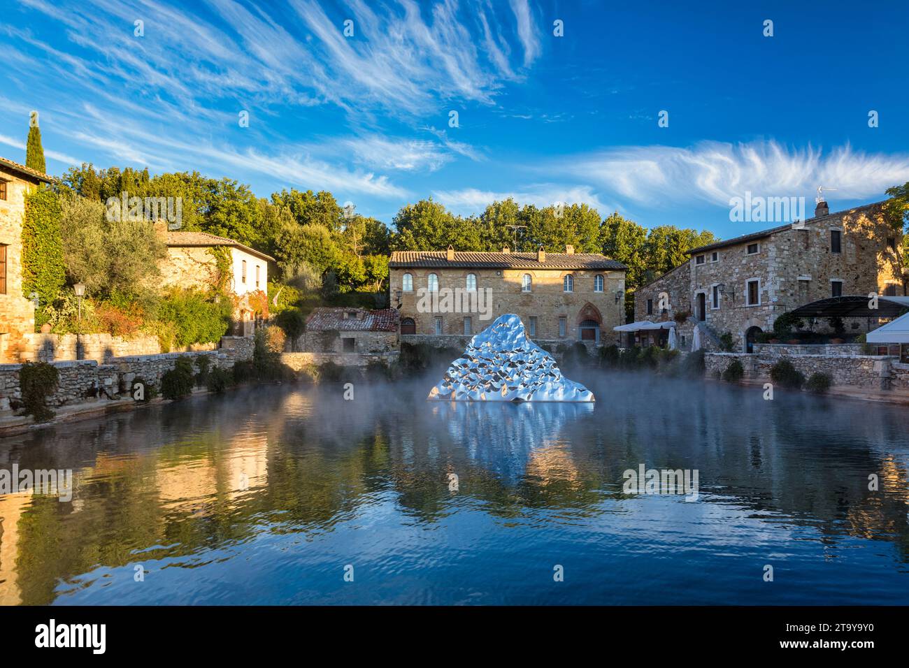 Thermal bath town of Bagno Vignoni, Italy during sunrise. Old thermal ...