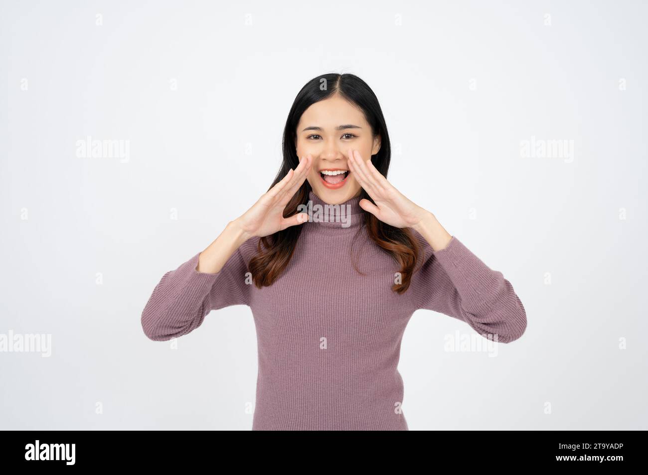 Pretty Asian business female woman with open mouth raising hand ...