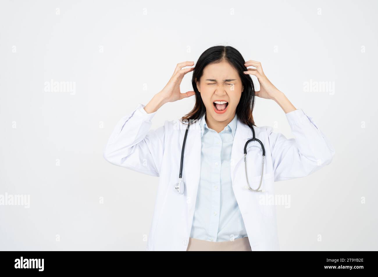 Doctor with headache stressed. Nurse / doctor with migraine headache ...