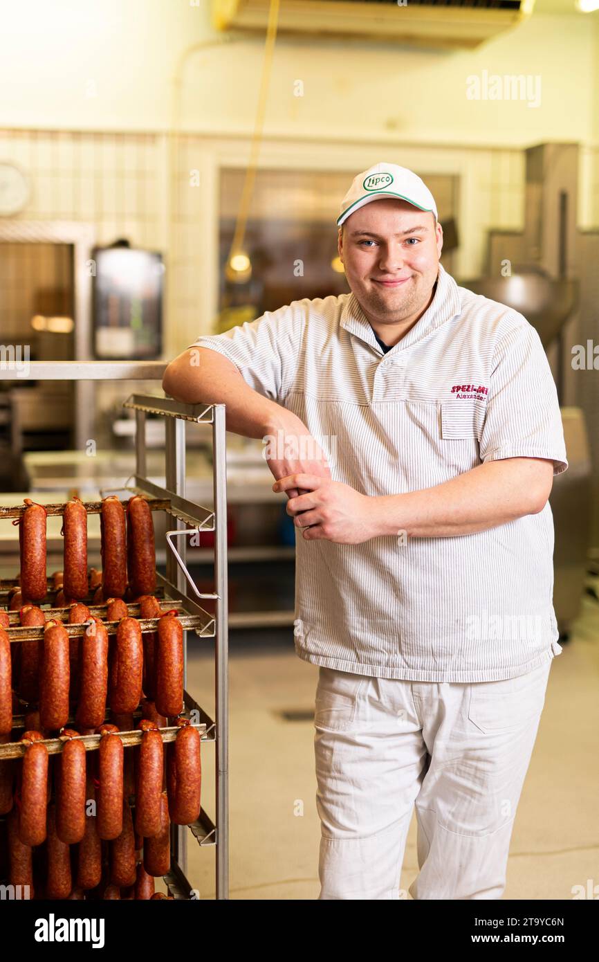 Wolsdorf, Germany. 22nd Nov, 2023. Alexander Richter, butcher, poses ...