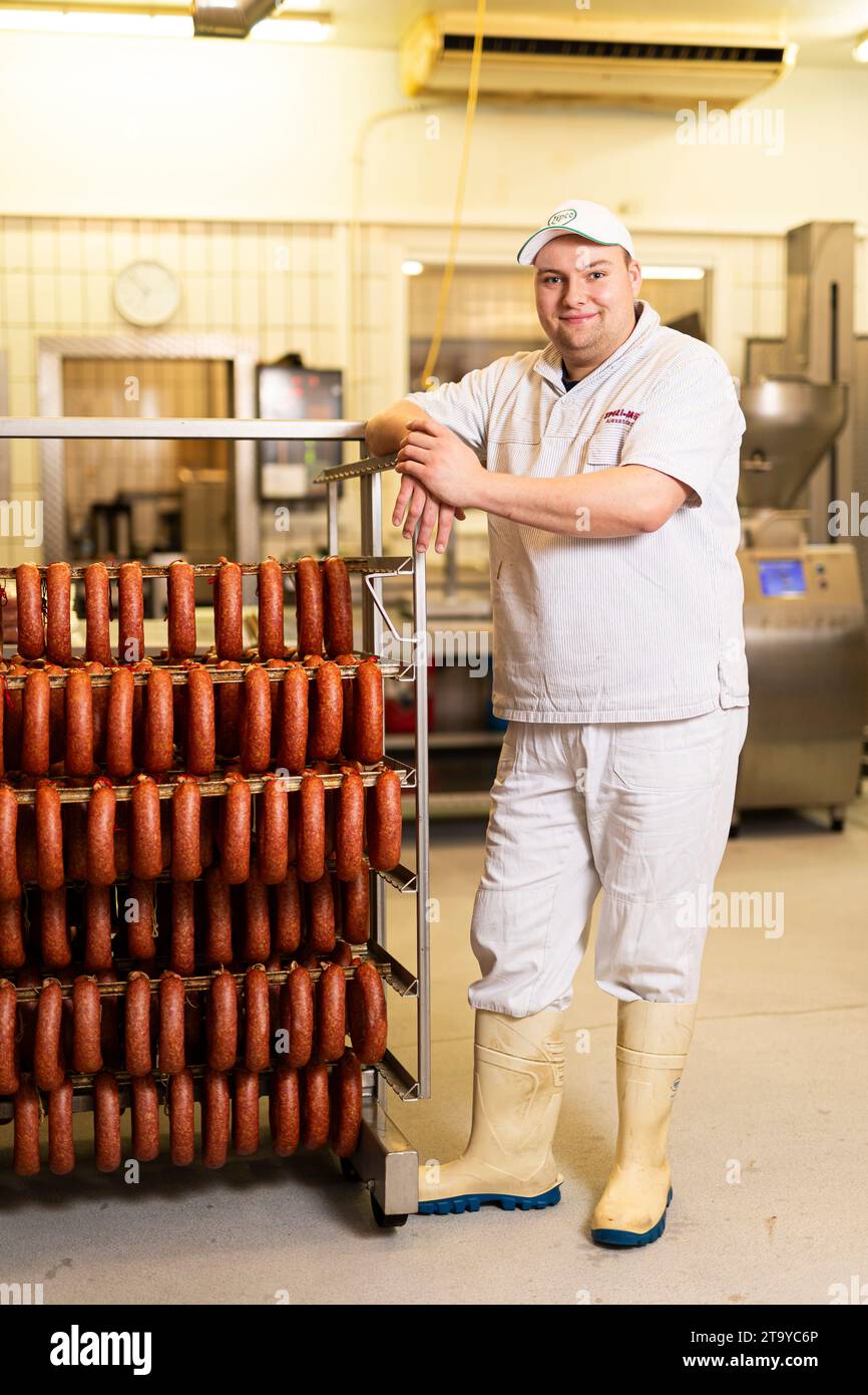 Wolsdorf, Germany. 22nd Nov, 2023. Alexander Richter, butcher, poses ...