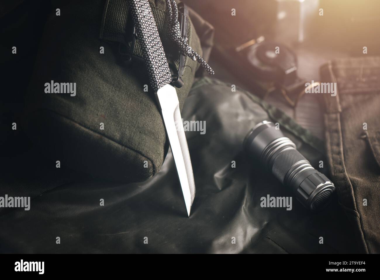 Close up stainless steel pocketknife with Tanto blade. Military object ...