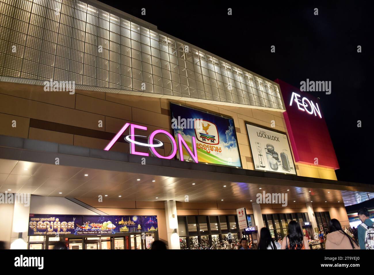 front of Aeon shopping mall , illuminated at night, in Phnom Penh ...