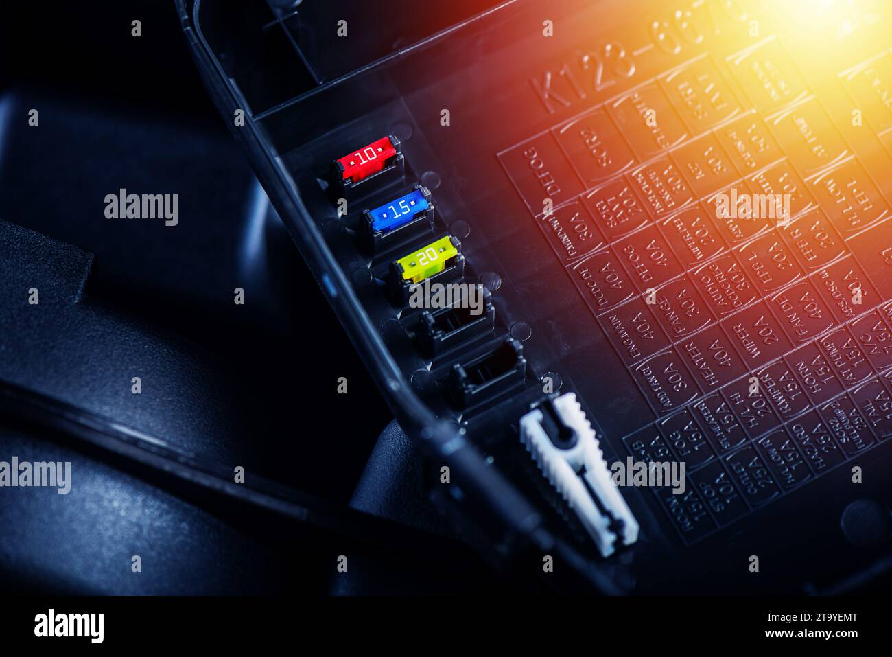 Spare fuses inside the backside of fuse box cover Stock Photo - Alamy