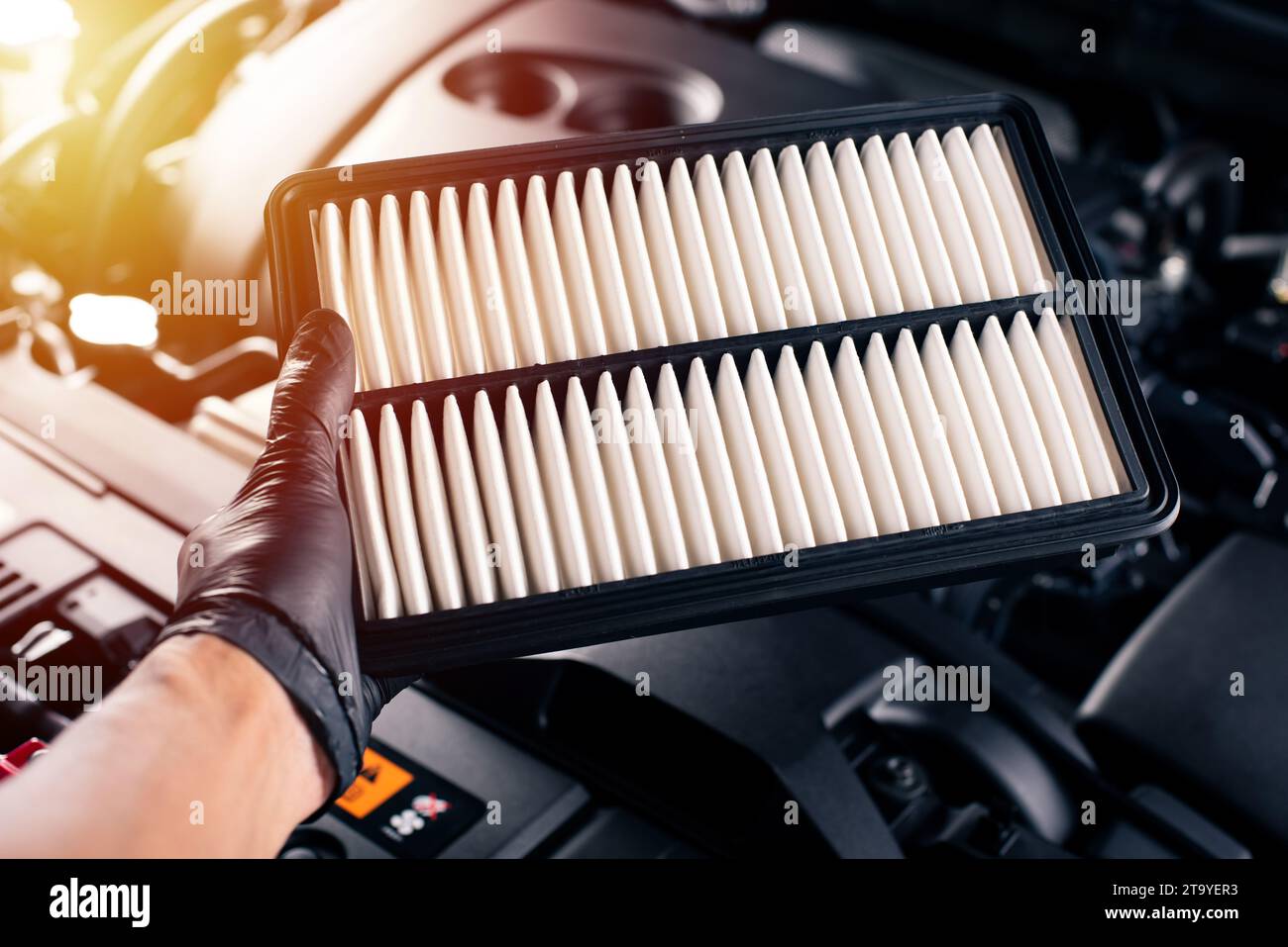 Changing car air filter, close up at the new and clean air filter in ...