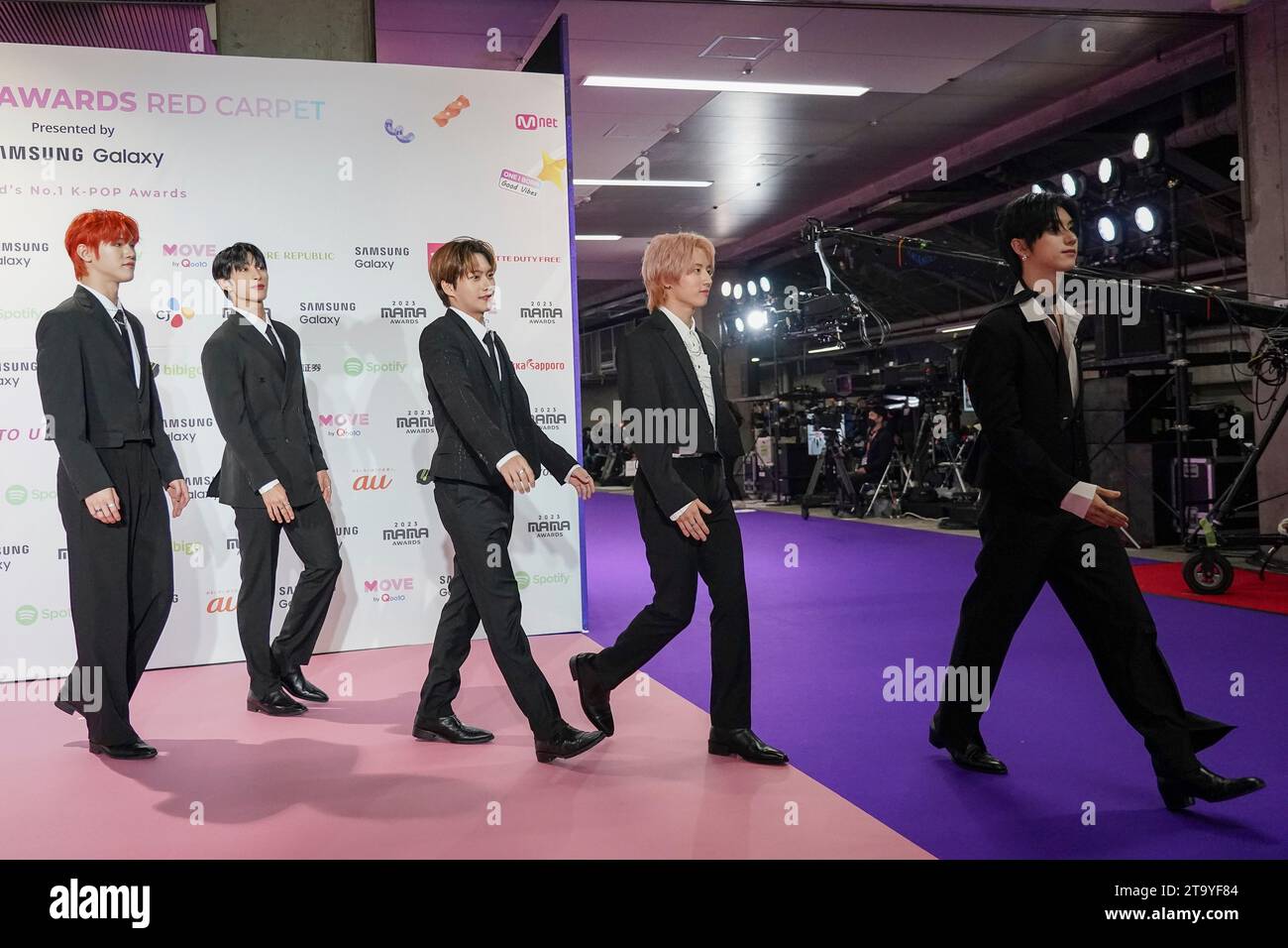 Members of the band Just B pose for photos on the red carpet of the 2023 MAMA Awards at Tokyo ...