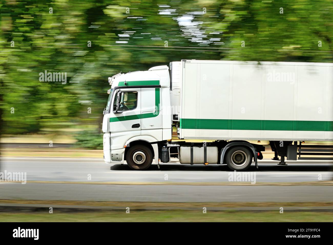 Road transport - car in motion Stock Photo - Alamy