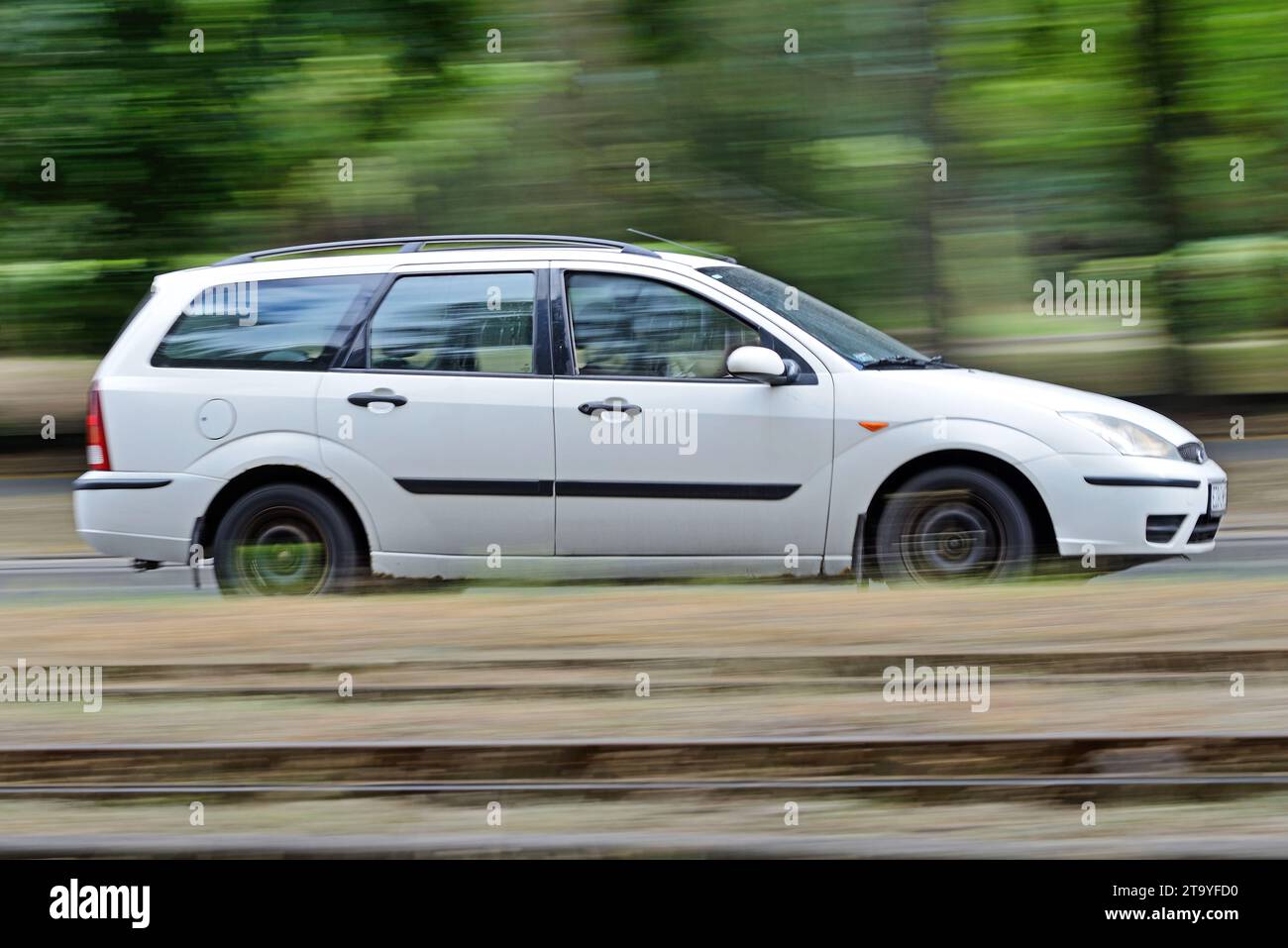 Road transport - car in motion Stock Photo - Alamy