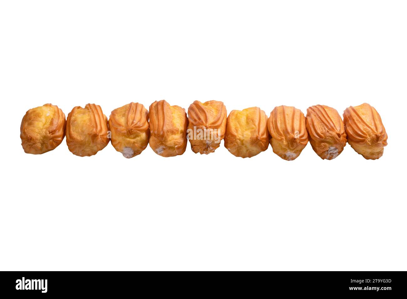 Sweet eclairs isolated on a white background. Top view Stock Photo - Alamy