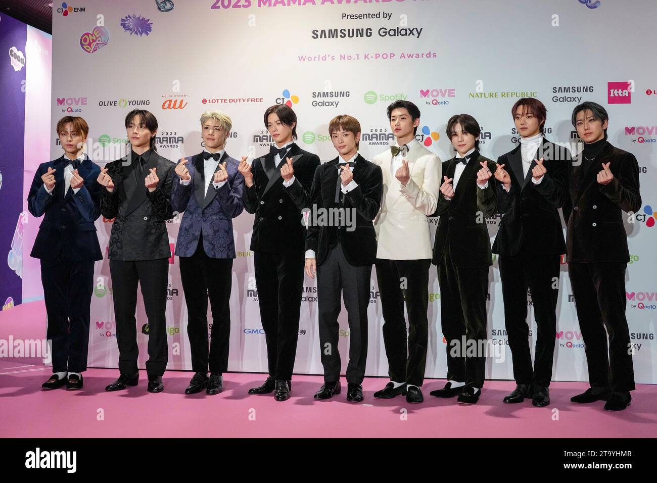 Members of the band &TEAM pose for photos on the red carpet of the 2023 MAMA Awards at Tokyo ...