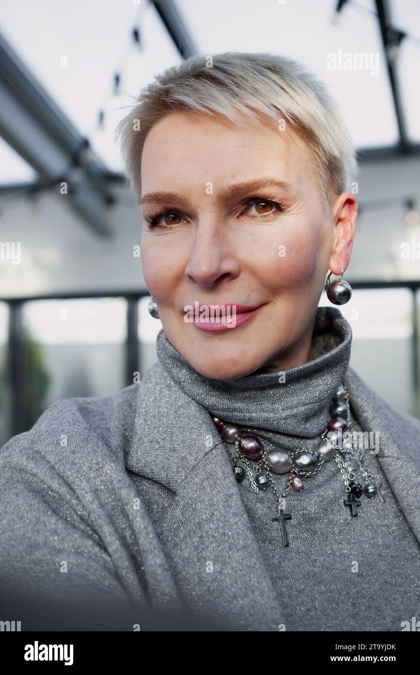Selfie Of Beautiful Mature Blonde Woman With Short Haircut Close Up