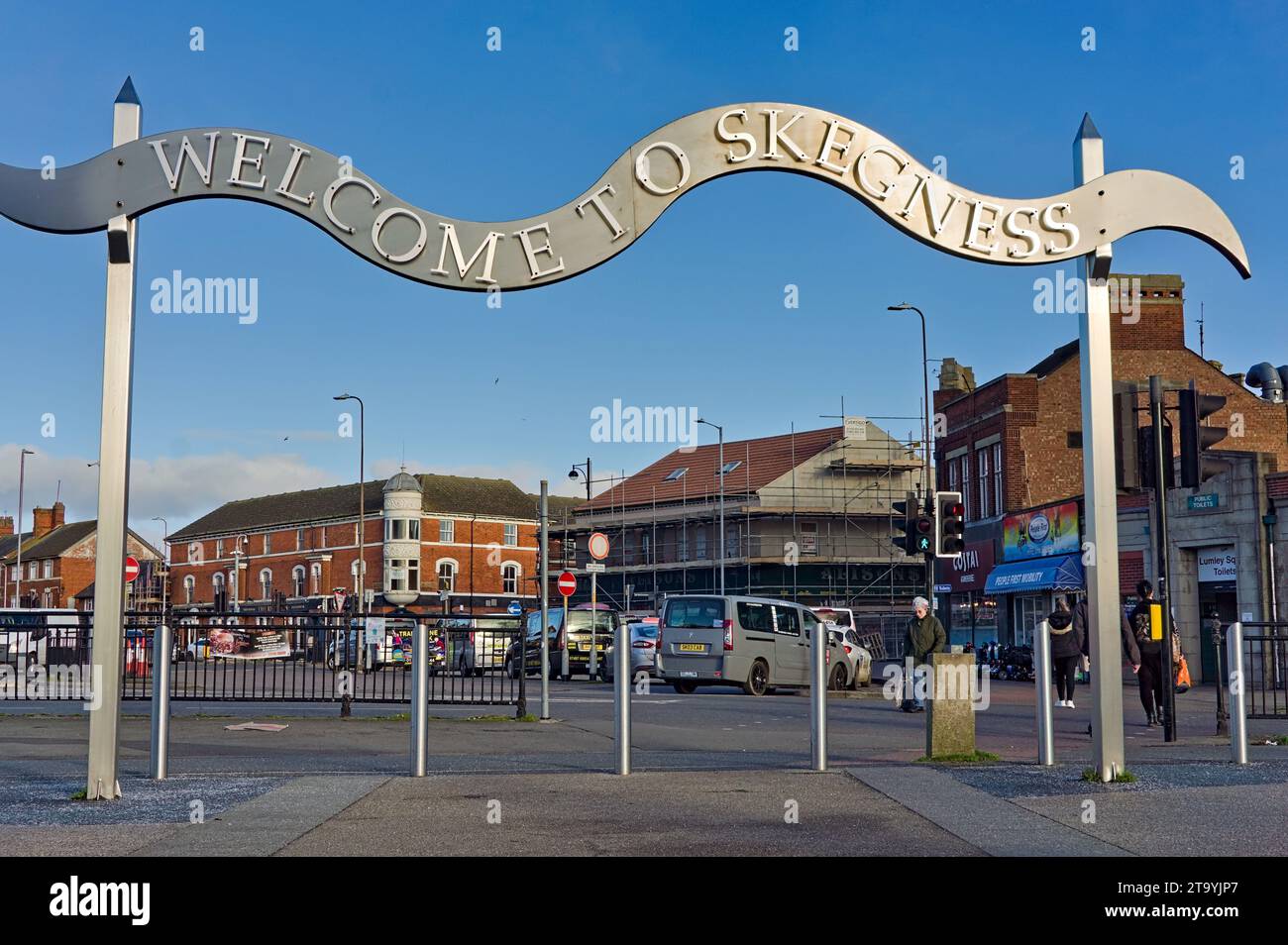 The Welcome to Skegness sign from the railway station with blue sky in ...