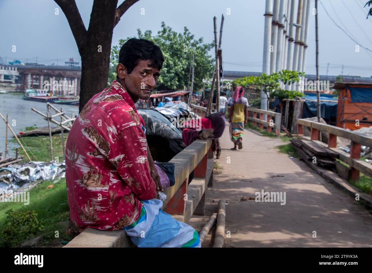 Traditional cargo boat station beside the riverbank. A picturesque ...