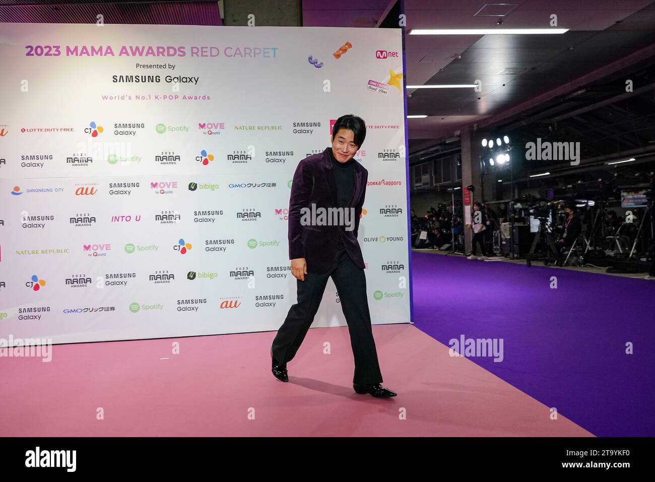 Ahn Jae-hong poses for photos on the red carpet of the 2023 MAMA Awards at Tokyo Dome Tuesday ...