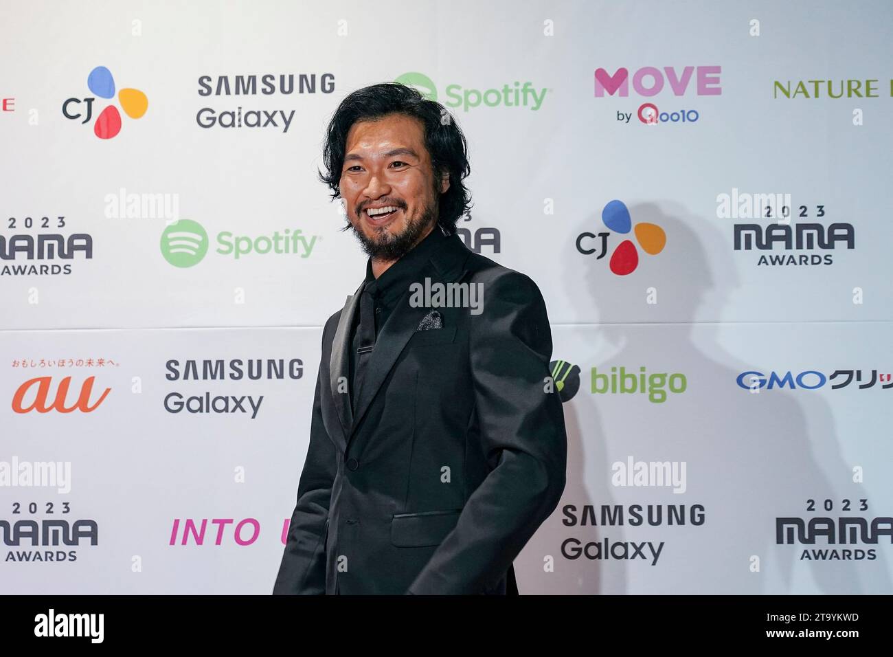 Munetaka Aoki poses for photos on the red carpet of the 2023 MAMA Awards at Tokyo Dome Tuesday ...