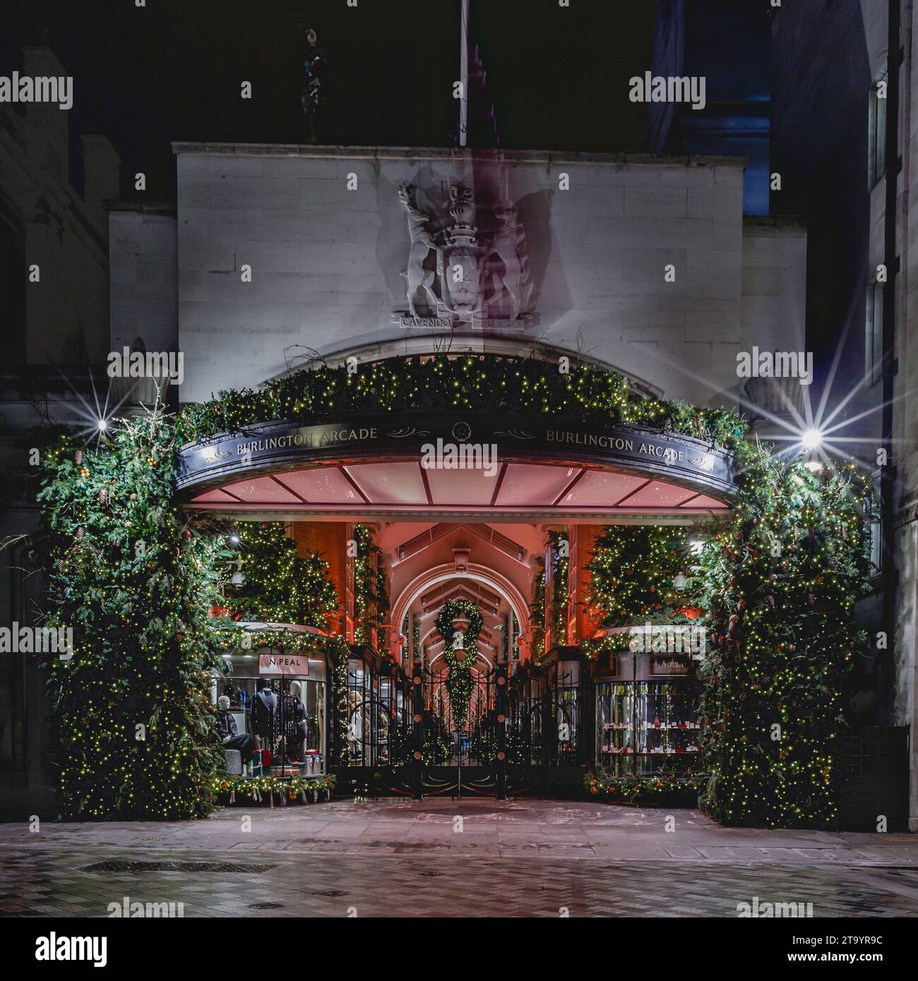 The facade of Burlington Arcade lit up with christmas decorations at ...