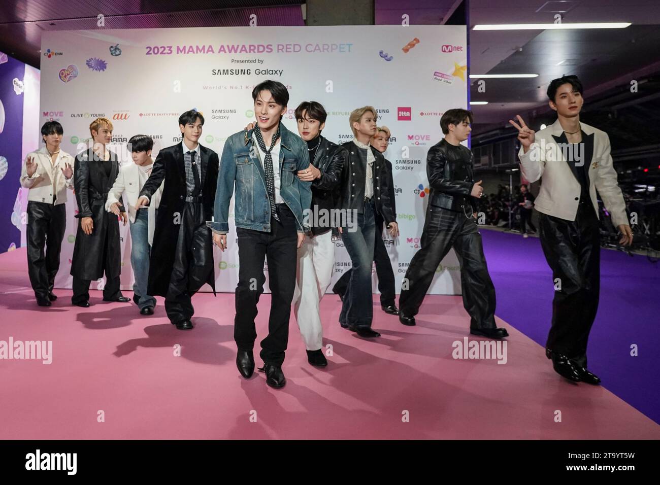 Members of JO1 pose for photos on the red carpet of the 2023 MAMA Awards at Tokyo Dome Tuesday ...