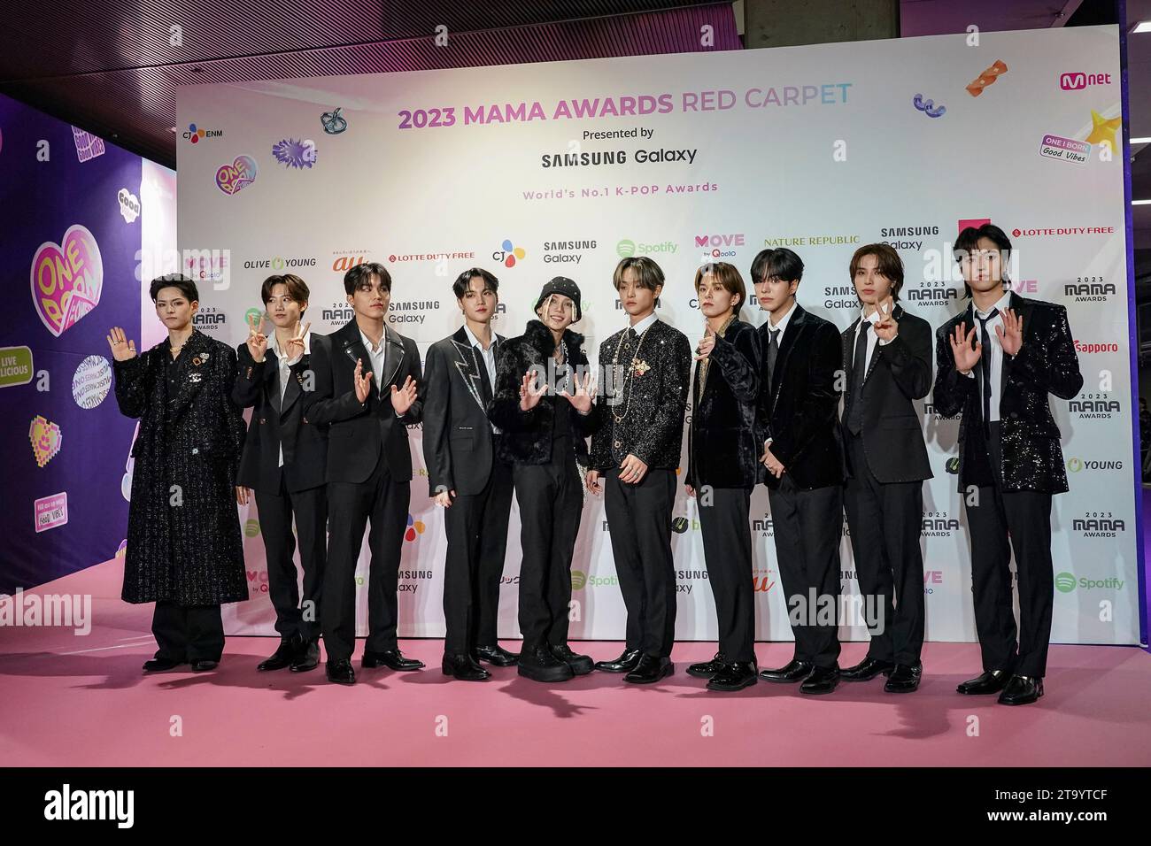 Members of TREASURE pose for photos on the red carpet of the 2023 MAMA Awards at Tokyo Dome ...