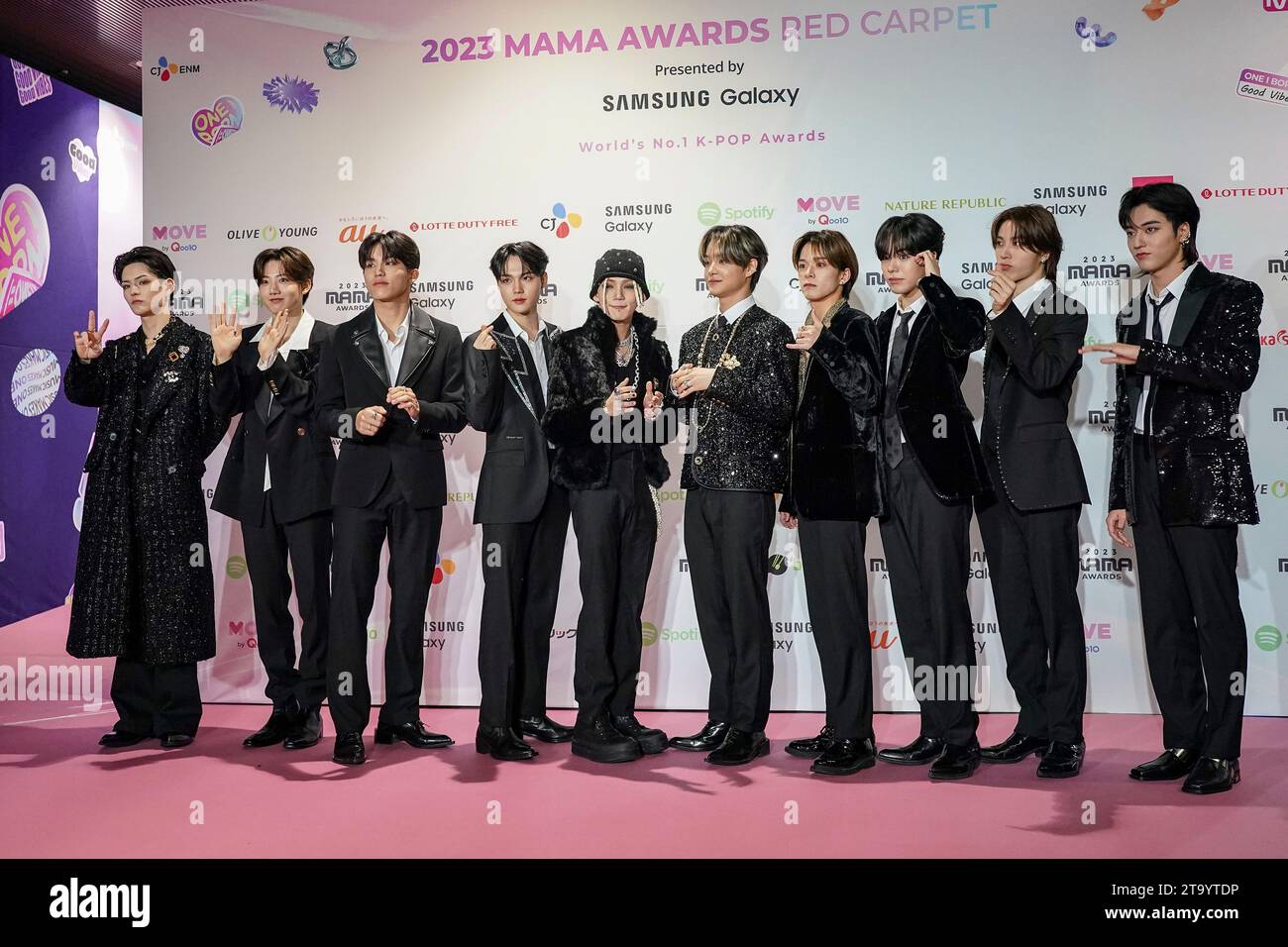 Members of TREASURE pose for photos on the red carpet of the 2023 MAMA Awards at Tokyo Dome ...