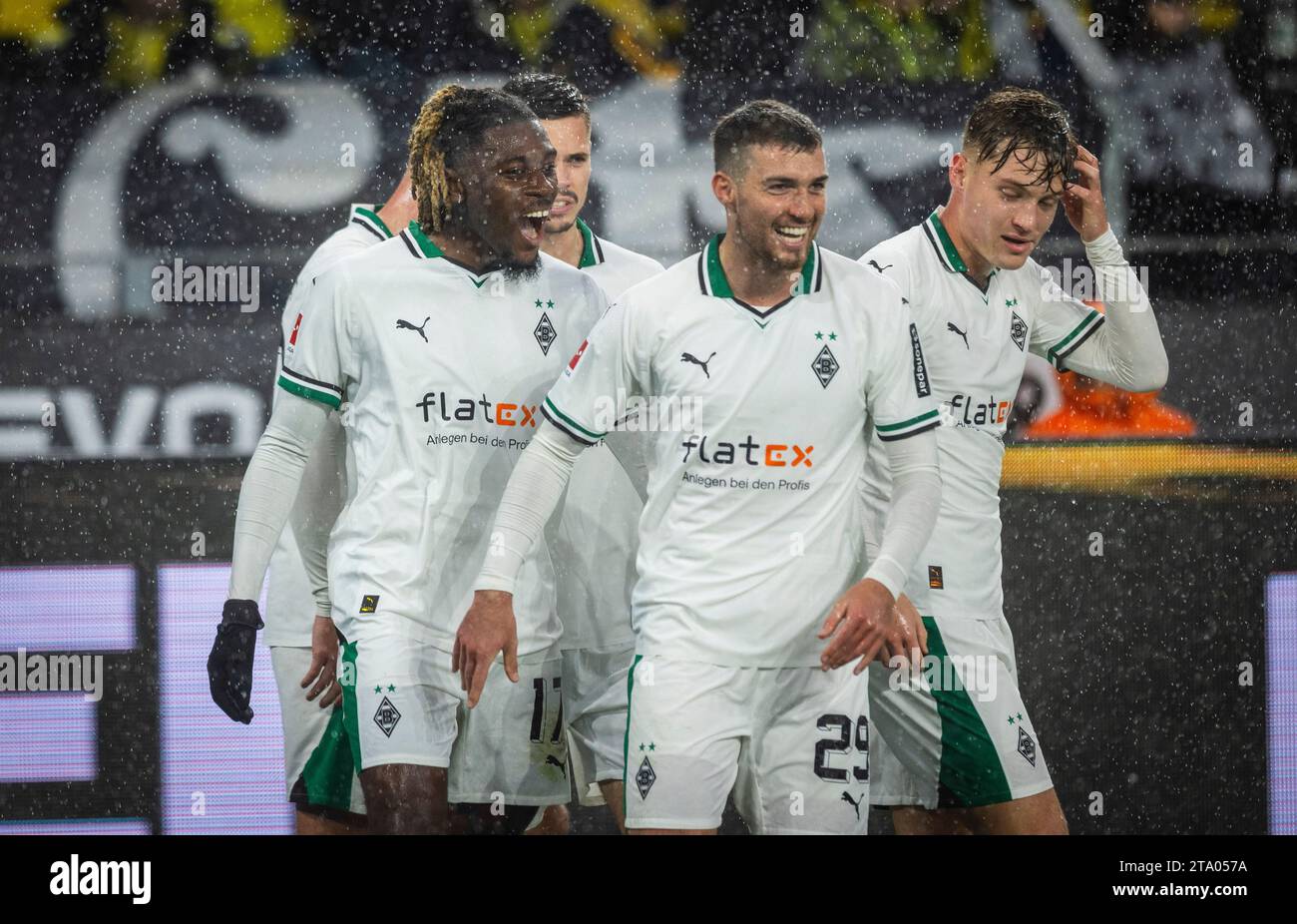 Dortmund, Germany. 25th Nov 2023. Kouadio Kone (BMG), Joe Scally (BMG ...